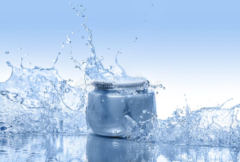 The Blue Jar of Moisturizing Cream Stays in the Water Splashes on the ...