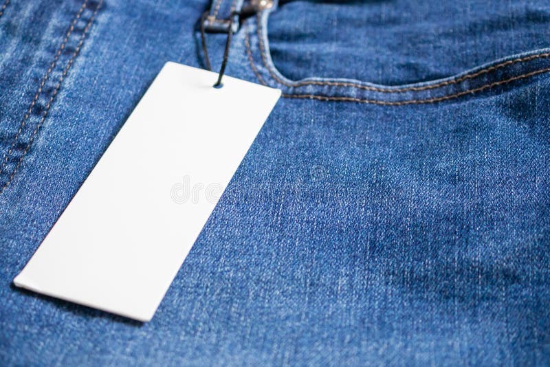 Blue Jeans with Blank White Label Tag Stock Image - Image of empty ...