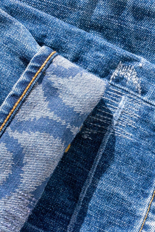 Blue Jeans with Patterns on the Cuffs and Decorative Seams Close Up ...