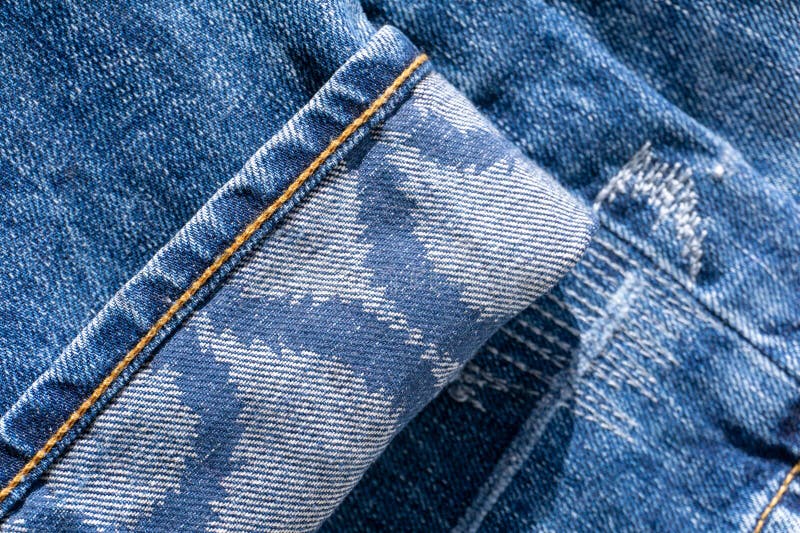 Blue Jeans with Patterns on the Cuffs and Decorative Seams Close Up ...