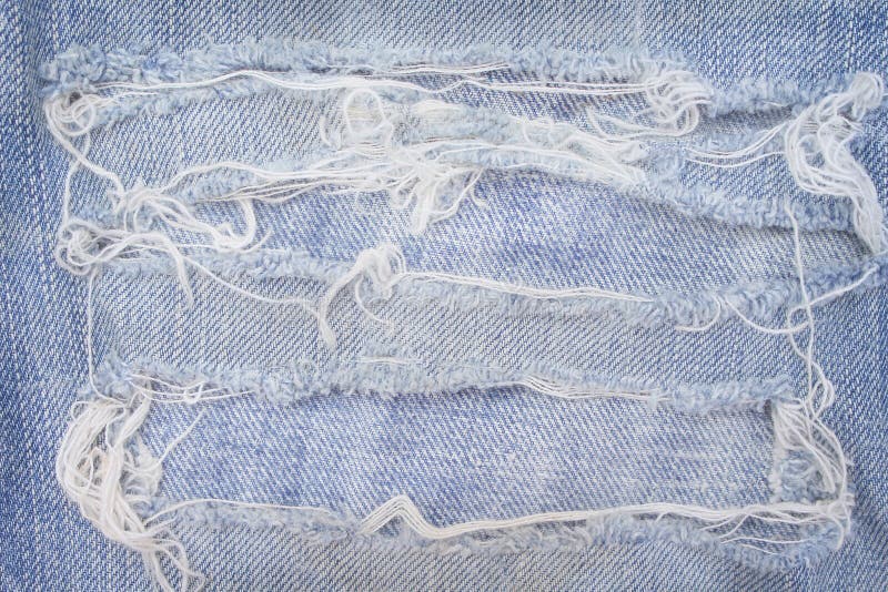 Blue Jeans With Ripped Patterns For Background, Hole And White Threads ...