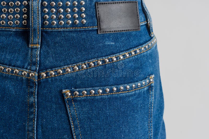 Blue Jeans Skirt Decorated with Metallic Rivets. Stock Photo - Image of ...