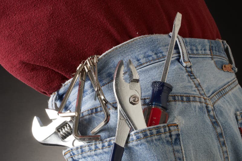Assorted Tools Stuffed into Pants Pocket Stock Photo - Image of blue ...