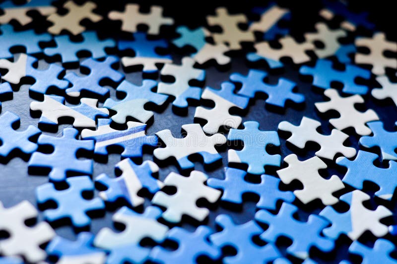 Blue jigsaw puzzle pieces stock photo. Image of blue - 180912874