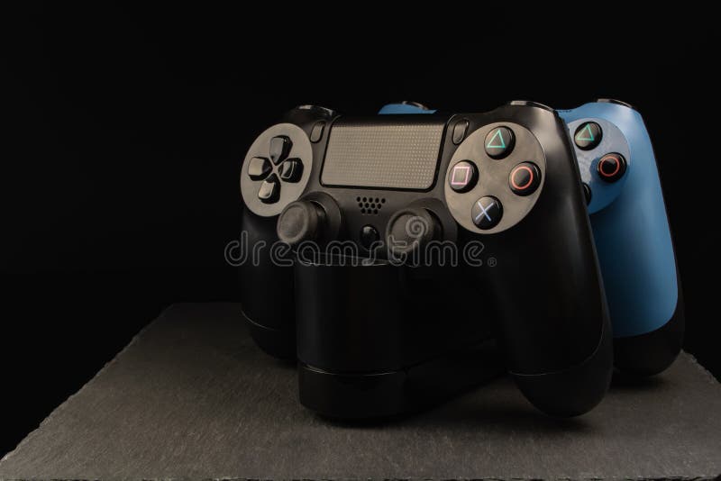 A Blue Joystick from a Game Console on a Black Background Editorial ...