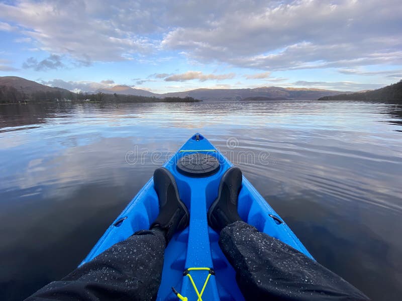 Blue Kayak on Open Water at Loch Lomond Stock Photo - Image of male ...