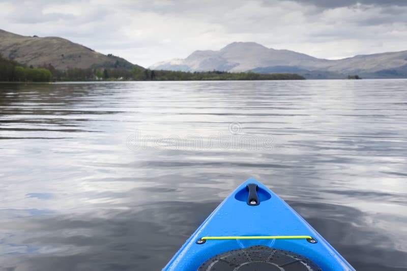 Blue Kayak on Open Water at Loch Lomond Stock Photo - Image of leisure ...