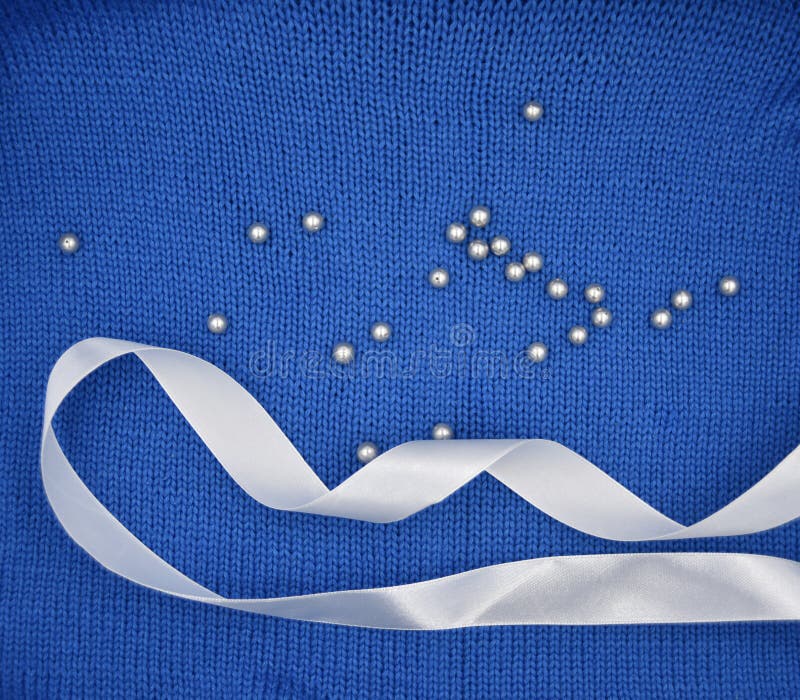 Blue Knitted Pattern, White Satin Silk Lace and Pearl Beads Stock Image ...