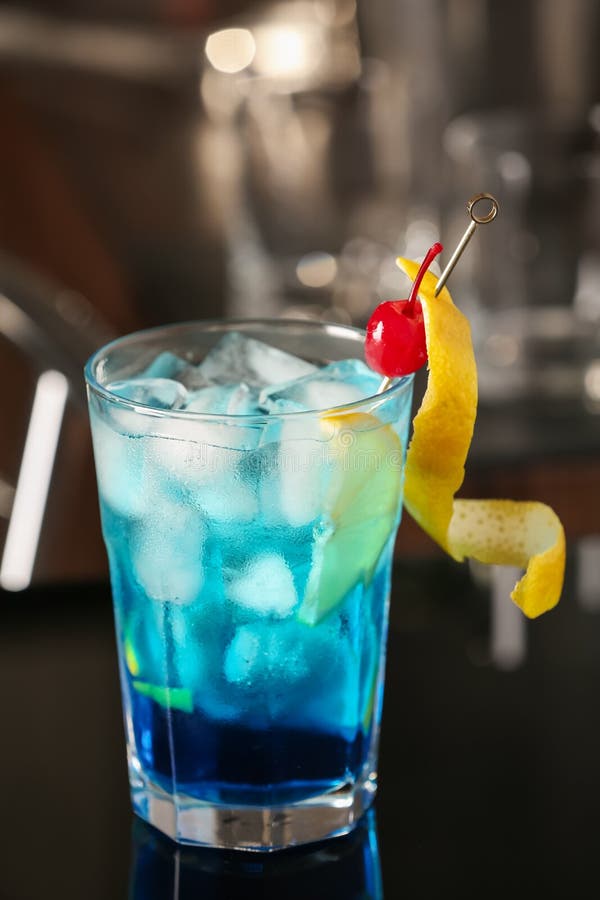 Blue Lagoon Cocktail on Black Table in Bar Stock Photo - Image of ...