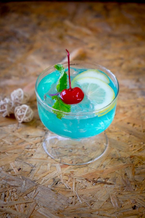 Blue Lagoon Cocktail with a Slice of Lemon Stock Image - Image of ...