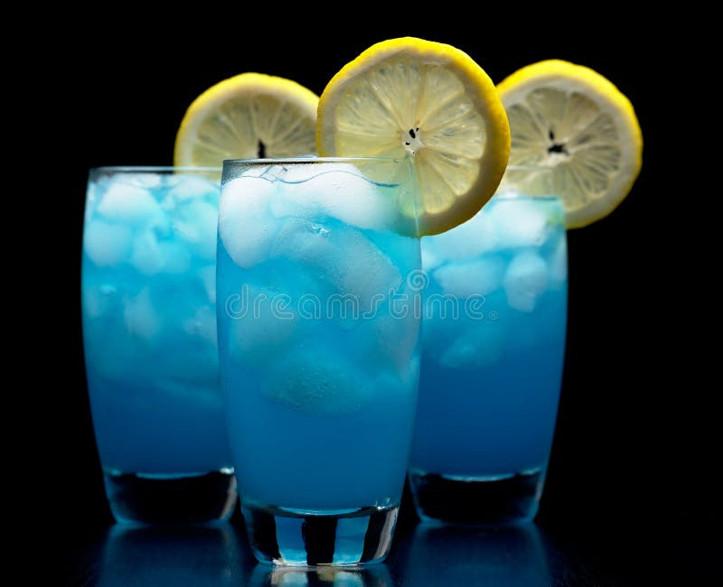 Blue Lagoon Drink with Lemon,straw and Ice Cubes on White Stock Photo ...