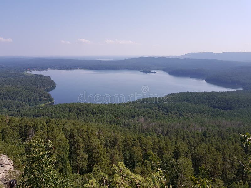 Blue Lake among the Green Siberian Taiga Stock Photo - Image of bubble ...
