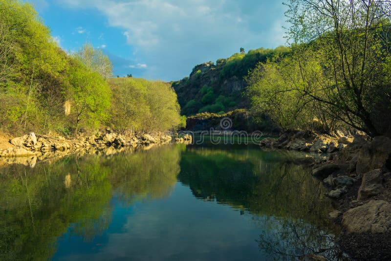 Blue Lake with Many Rocks Around Stock Photo - Image of summer, leaf ...