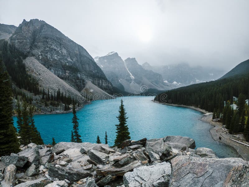 Blue Lake with Rocks during Rainy Day Stock Photo - Image of rocks ...