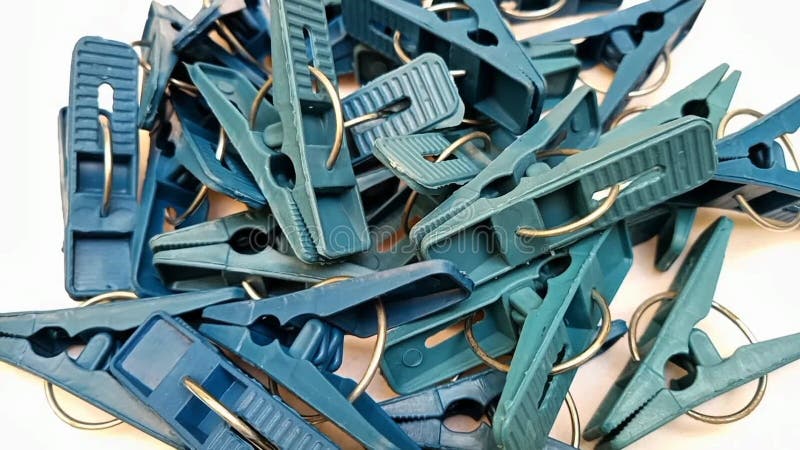 Blue Laundry Clips Rotating on the White Background, Plastic Clothes ...