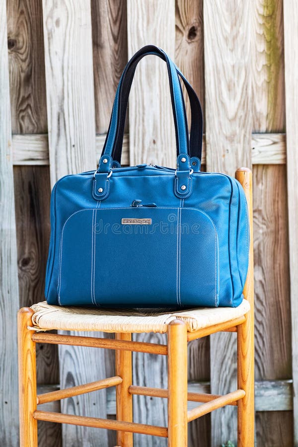 Blue Leather Laptop Bag with Long Handles Sits on a Chair Editorial ...