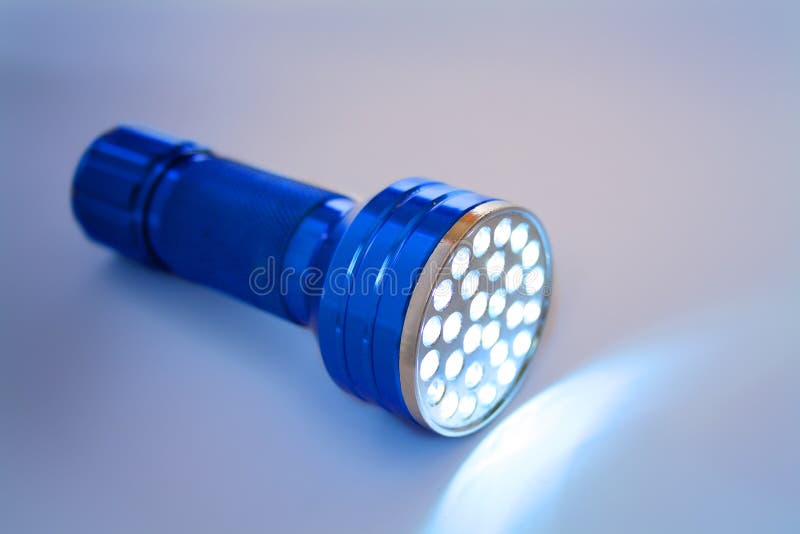 Blue led flashlight lit stock image. Image of illumination - 13205415