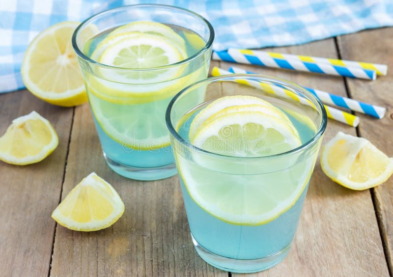 Blue lemonade stock image. Image of lemon, leaf, juicy - 55731353