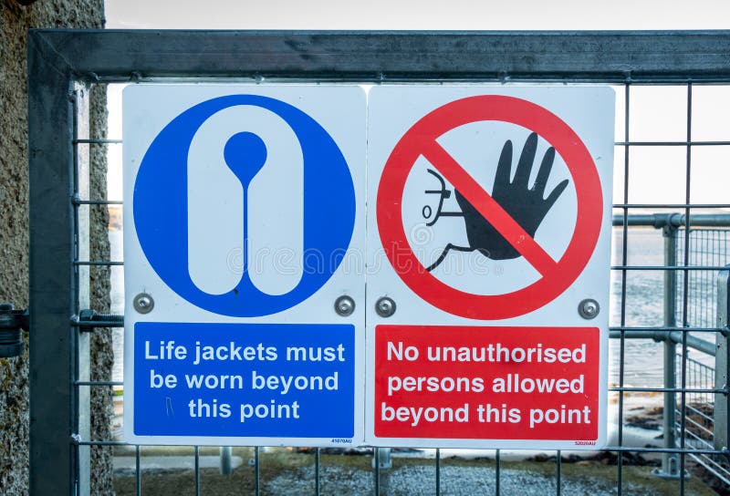 Blue Life Jackets Must Be Worn Beyond this Point Sign on a Metal Gate ...