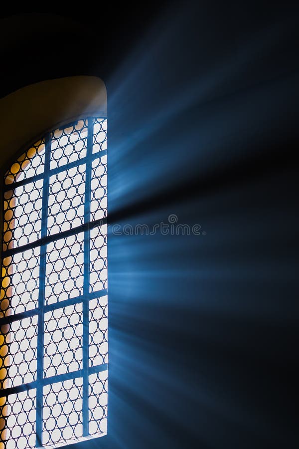 Light Rays through the Blue Window. Yellow Toned Photo Stock Photo ...