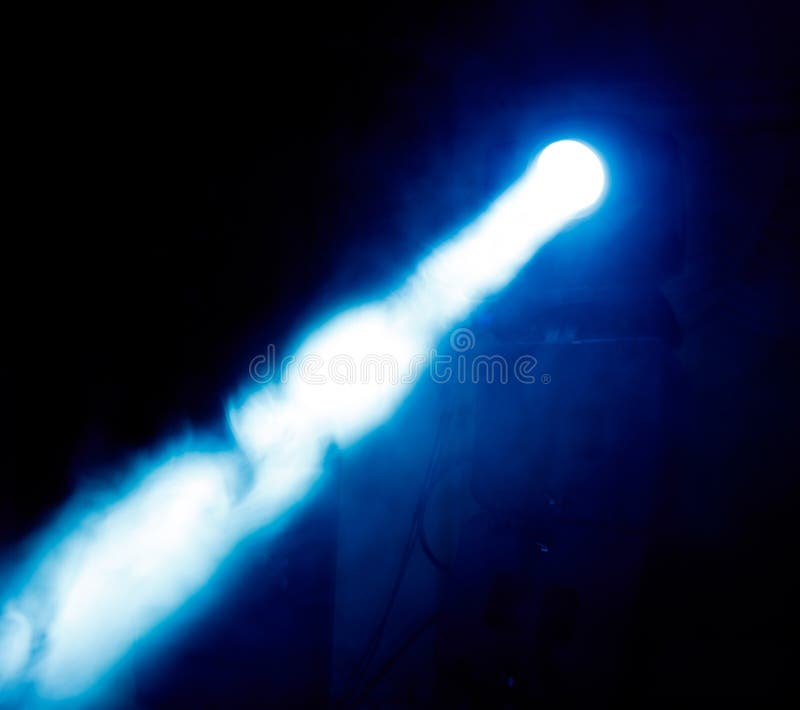 A Blue Light is Shining on a Dark Background Stock Photo - Image of ...