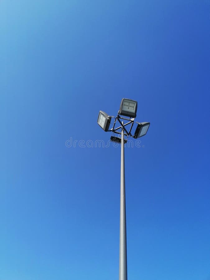 Blue lighting pole editorial stock photo. Image of metal - 212052128