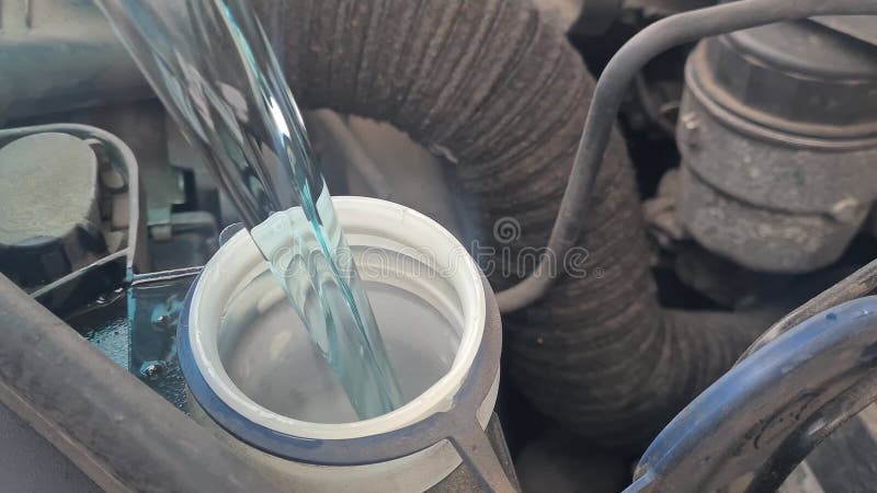 Blue Liquid for Cleaning the Windshield in Tank of Car Stock Footage ...