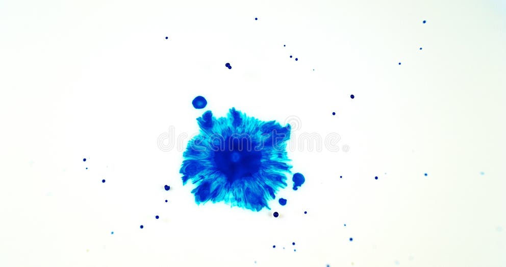 Blue Liquid Falling into Water Against White Background Stock Photo ...