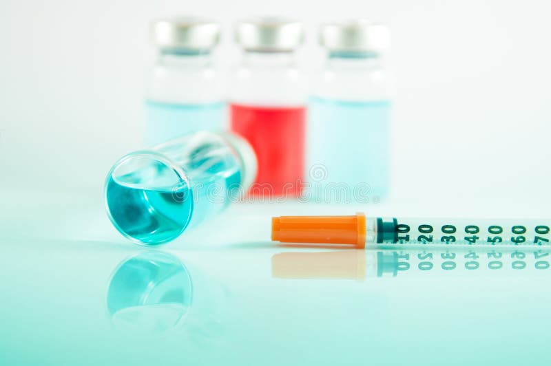 Blue Liquid in Injection Vial and Syringe Stock Photo - Image of ...