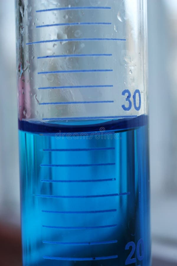 Measuring Cylinder with Blue Substance. Stock Image - Image of color ...
