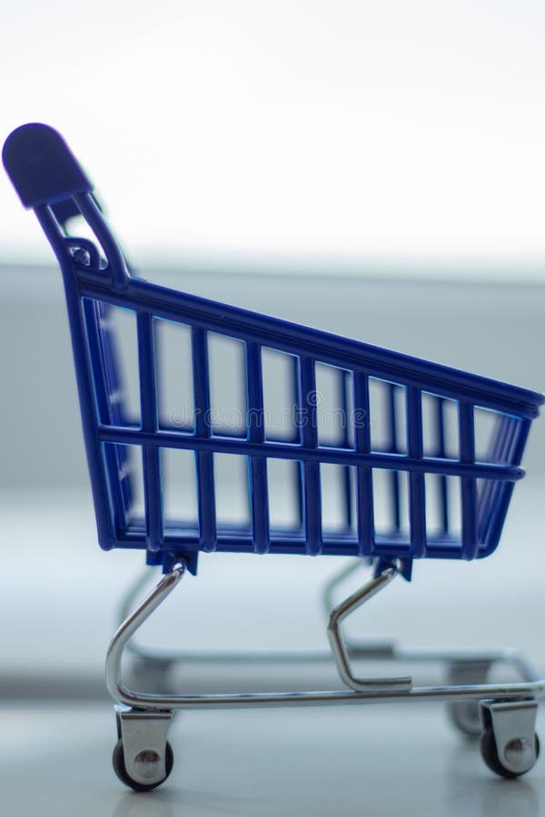 Blue Little Empty Supermarket Trolley for Groceries on a Light ...