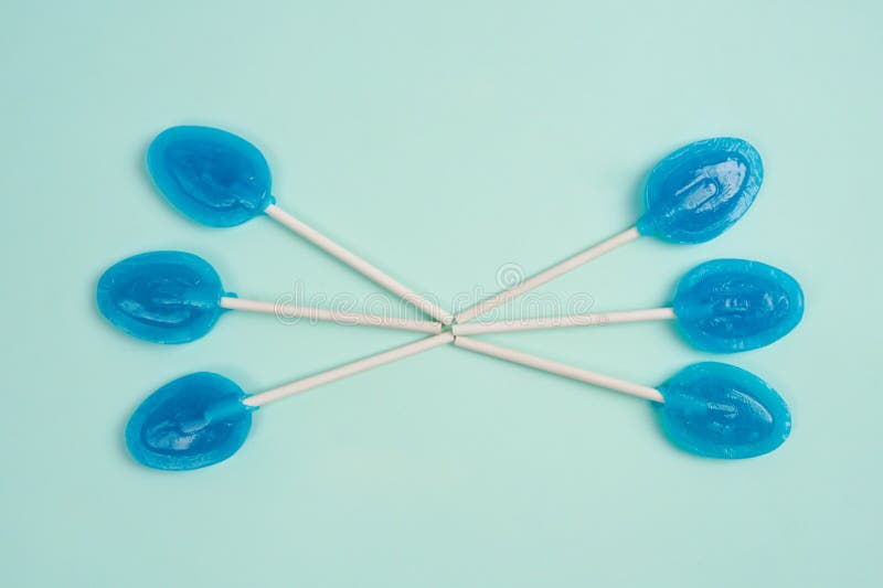 Blue Lollipop Isolated on Blue Background. Stock Image - Image of plain ...