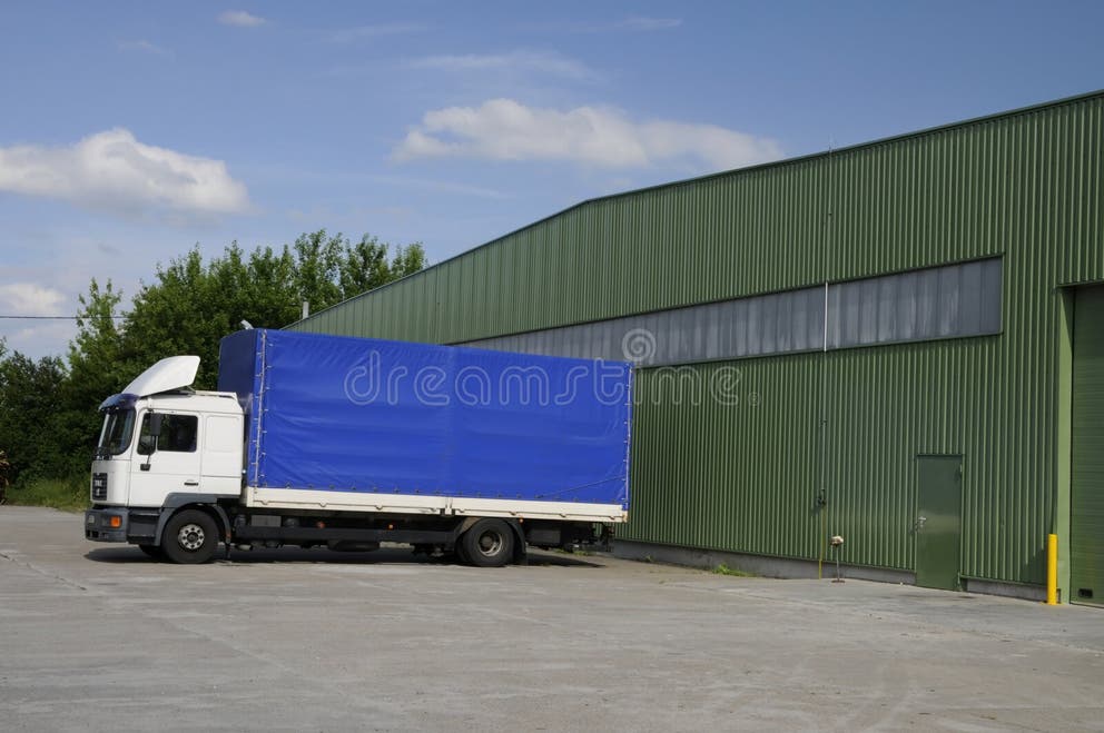 Blue lorry stock image. Image of transport, cargoe, clouds - 14992513