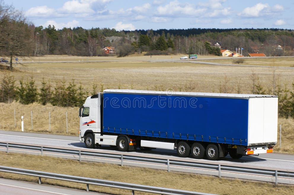 Blue lorry in countryside stock image. Image of route, industry - 698393