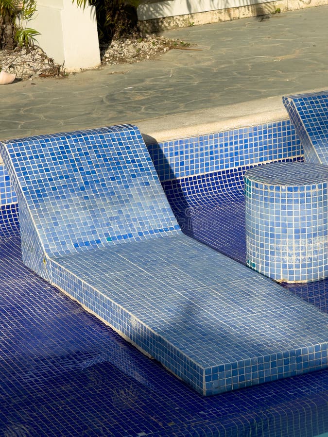 Blue Lounge Chair is Sitting in a Pool Stock Image - Image of garden ...