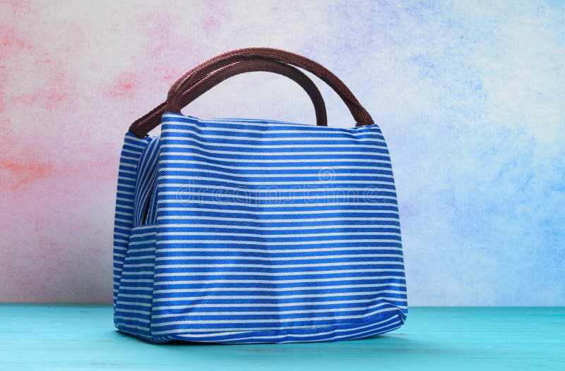 Blue Lunch Pack Carrier or Insulation Bag on Wood Table Stock Image ...