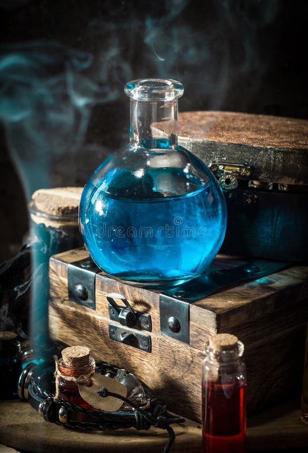 Blue Magic Potion with Smoke Stock Image - Image of faerie, decoration ...