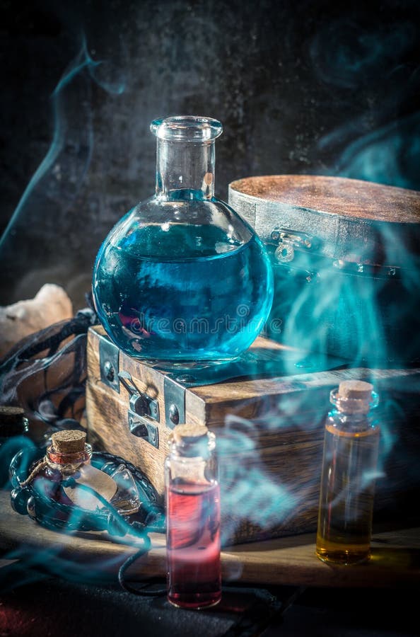 Blue and Red Magic Potions with Smoke Stock Photo - Image of night ...