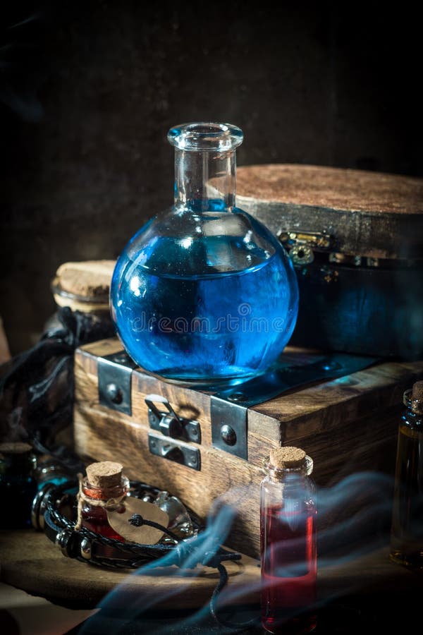 Blue and Red Magic Potions with Smoke Stock Photo - Image of night ...