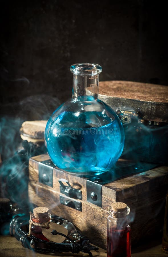 Blue Magic Potion with Smoke Stock Photo - Image of objects, liquid ...