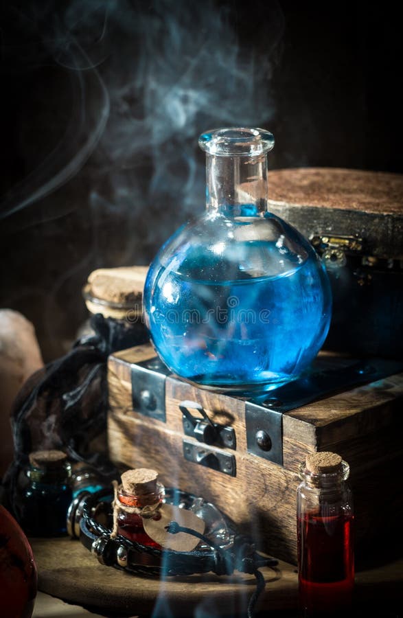 Blue Magic Potion with Smoke on Wooden Box. Dark Magic Concept Stock ...