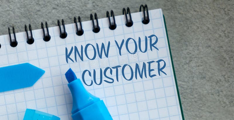 A Blue Marker is on a Spiral Notebook with the Words Know Your Customer ...