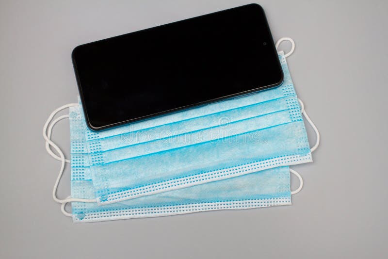 Blue Masks with Telephone on Gray Background Stock Image - Image of ...