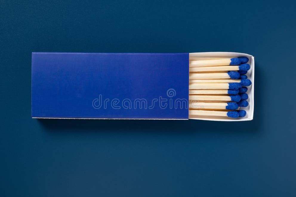 A Blue Matchbox and Blue Match Sticks on a Black Background Stock Image ...