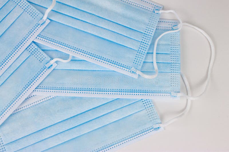 Blue Medical Masks on a White Background Stock Image - Image of ...