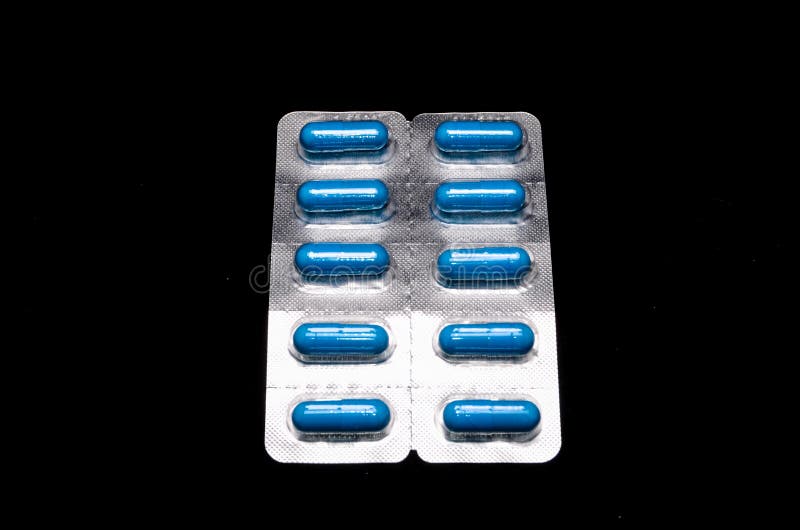 Blue Medication Capsules in Blister Pack Stock Photo - Image of ...