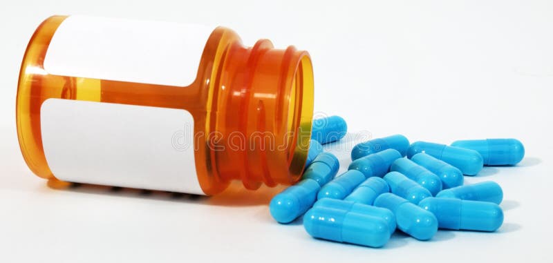 Capsules Spilling from Orange Plastic Container Stock Image - Image of ...