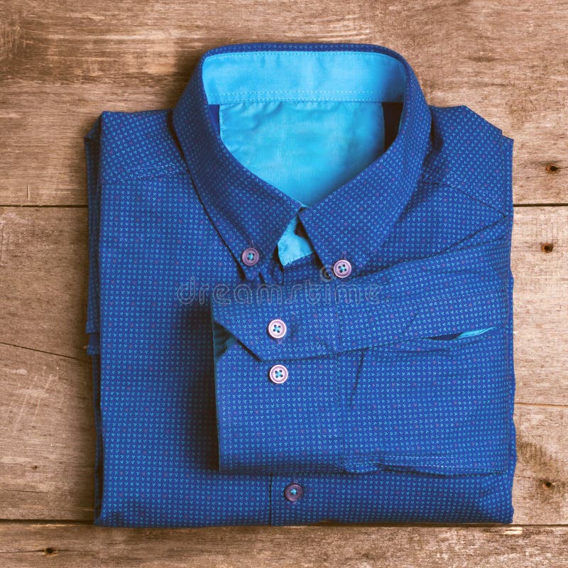 A Blue Men Shirt is on Wooden Background. Square Stock Photo - Image of ...