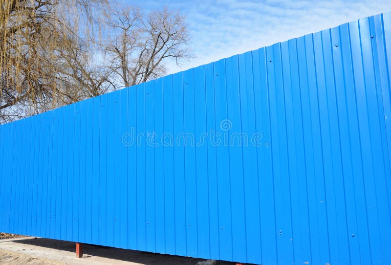 Blue Metal Fence Panels Installed without Any Foundation Using Metal ...