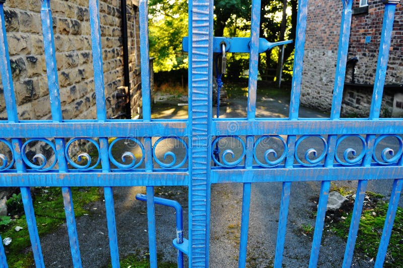Blue Metal Gate Gold Tips Swirl Stock Photo - Image of openwork, mesh ...